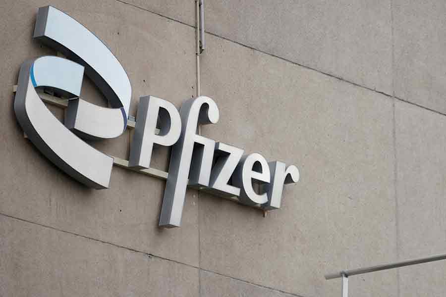 Pfizer slashes revenue forecast on lower Covid-19 drug sales | The ...