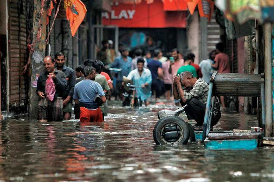 Eleven dead in Indian capital after heavy rain, flight operations stutter | The Financial Express