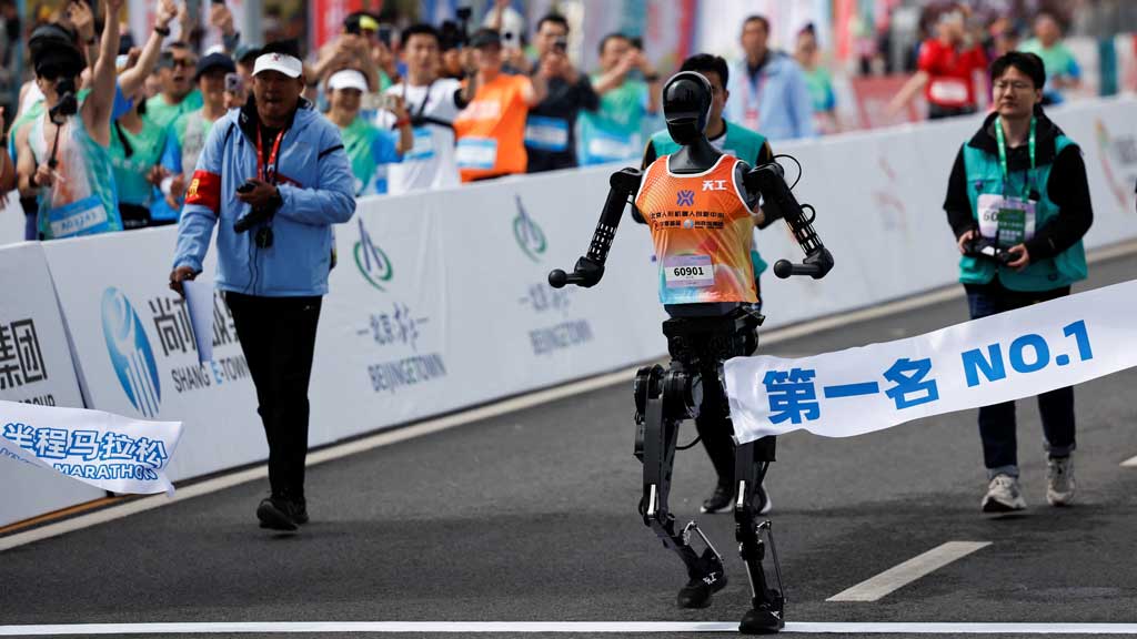China pits humanoid robots against humans in half-marathon | The ...