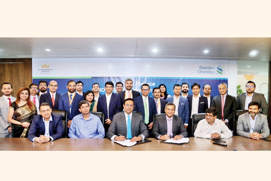 Standard Chartered Bank signs MoU with BAT Bangladesh | The Financial ...
